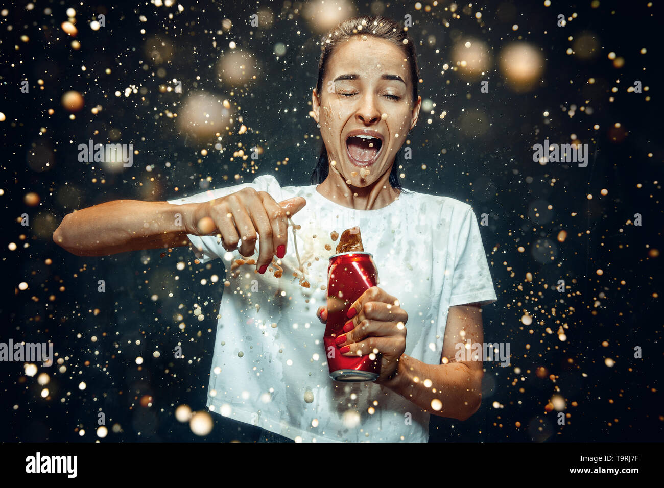 Girl drinking can coke hi-res stock photography and images - Alamy