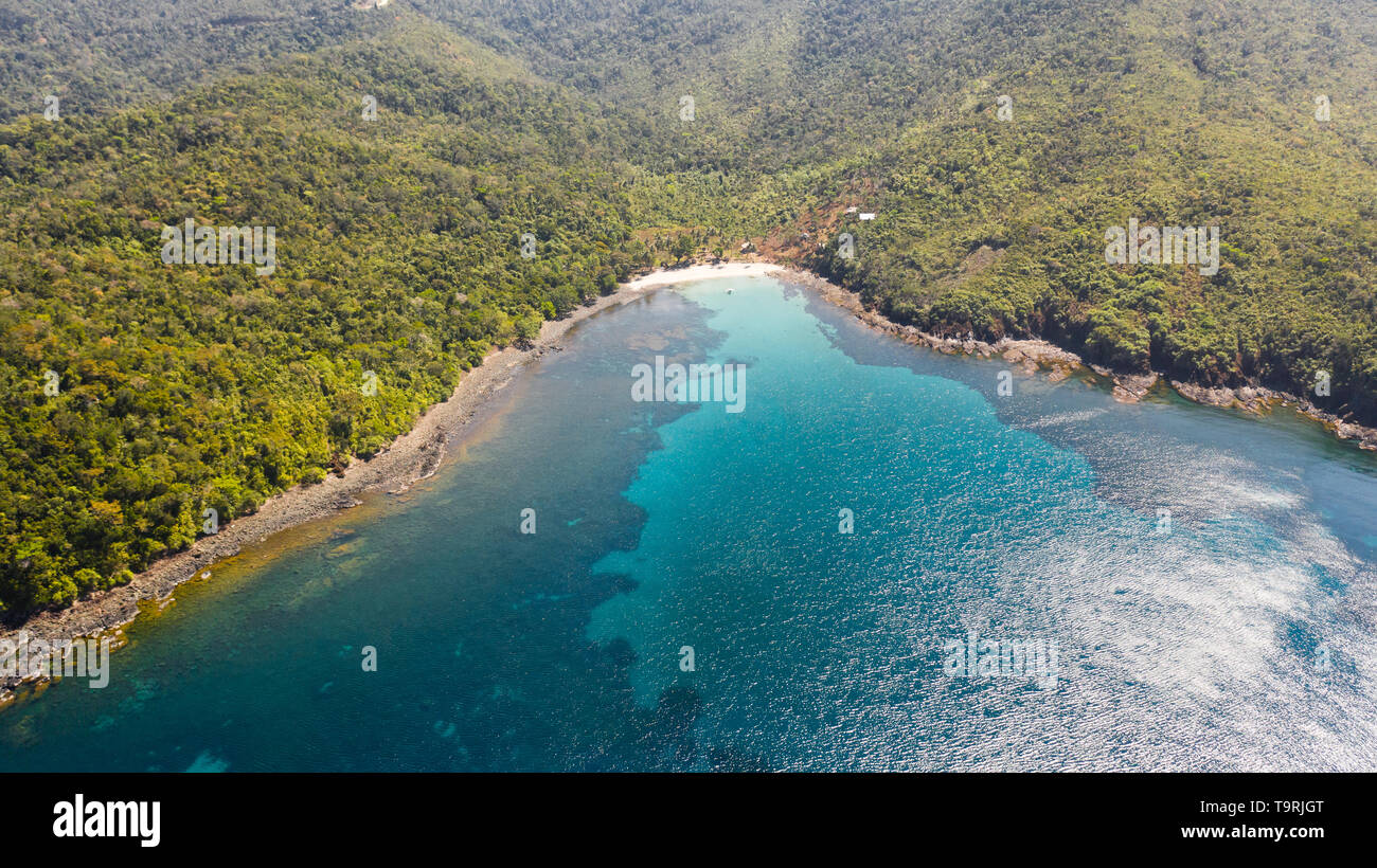 Sea bay with turquoise water and a small white beach.Coast of the ...