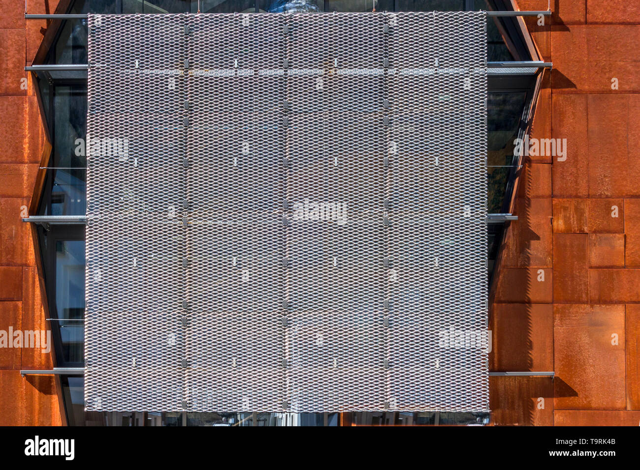 Modern architecture building wall of iron plates covering with fixed ...