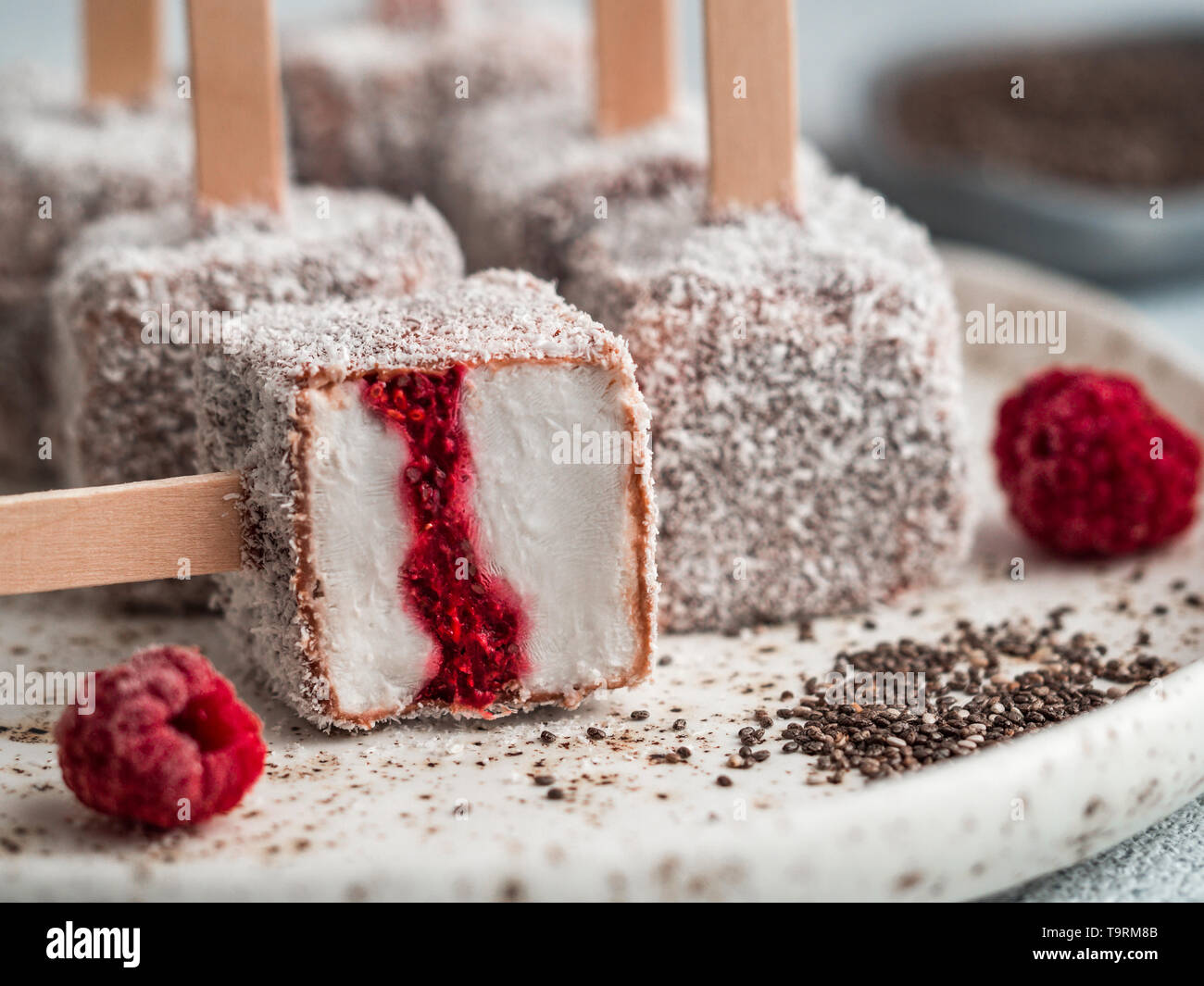 Homemade raw lamington ice cream pops on light background. Australian ...