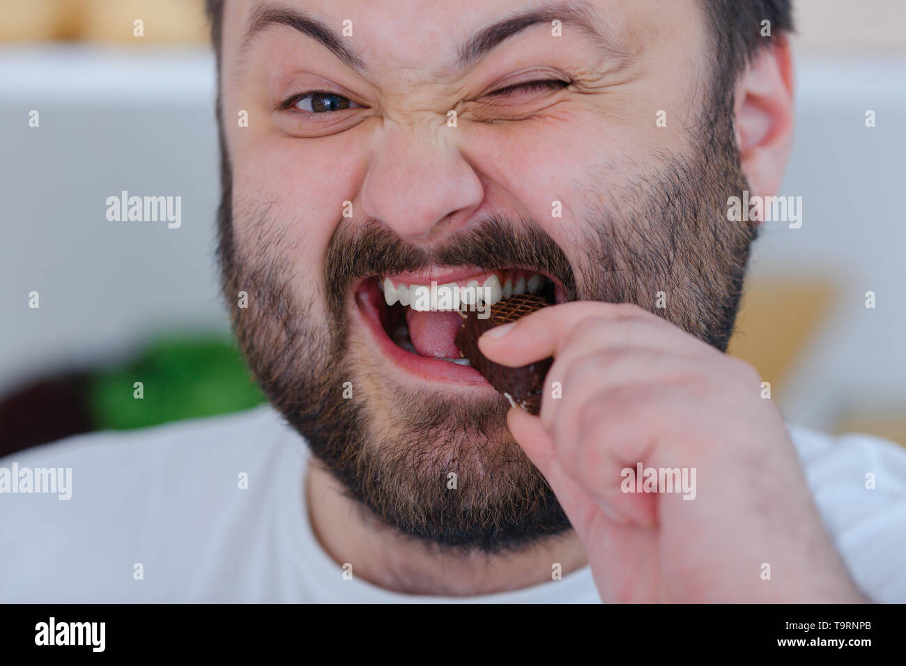 Man with candy bar hi-res stock photography and images - Alamy