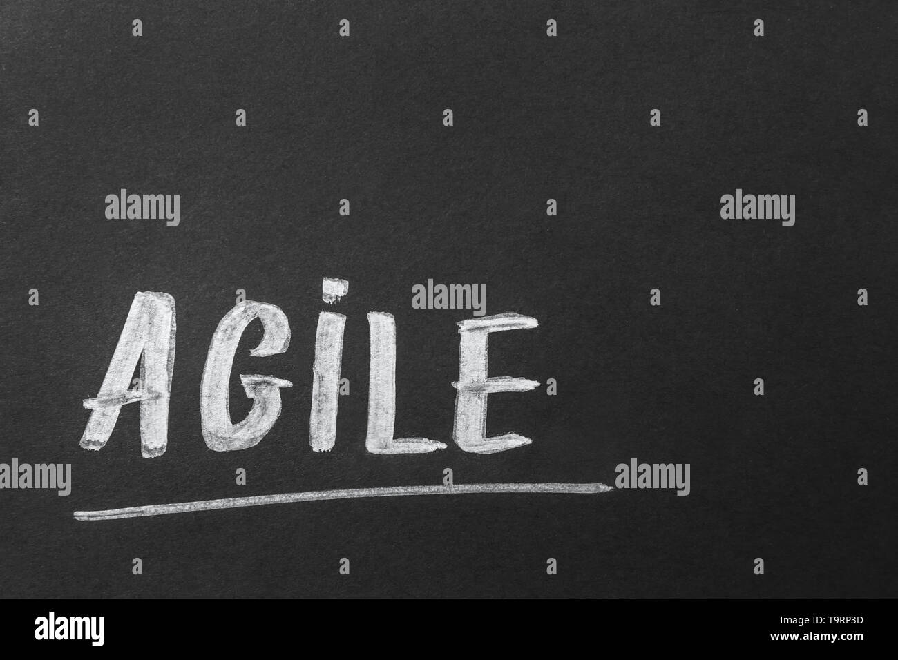 Word AGILE on dark background Stock Photo - Alamy