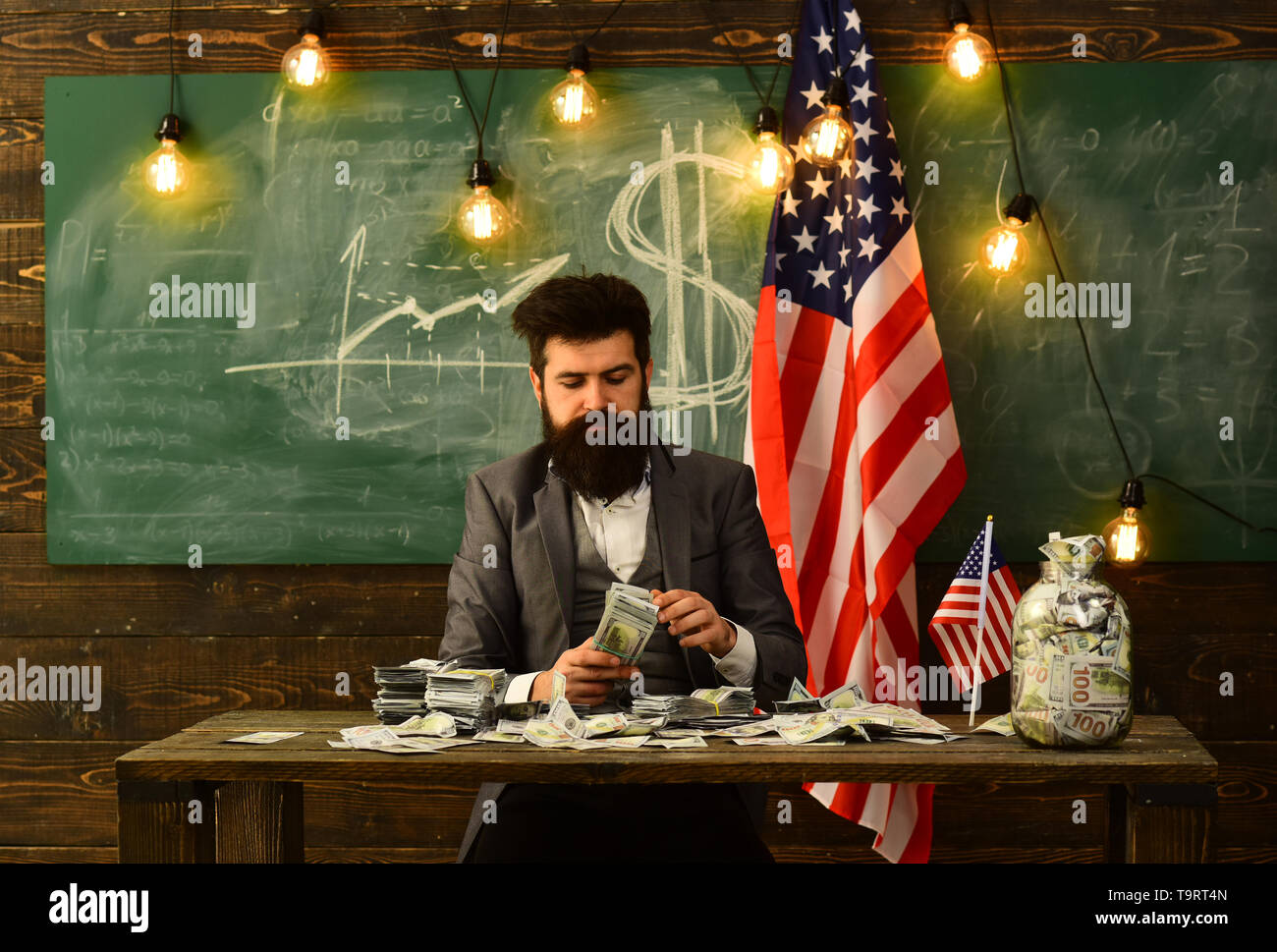 handout and loan. handout concept with bearded man holding dollar money ...