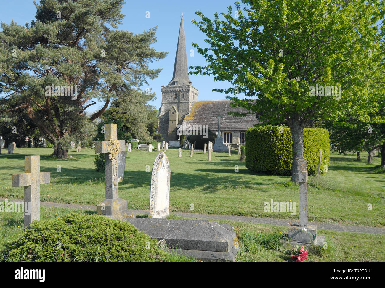 the parish church and graveyard in the west sussex village of cuckfield ...