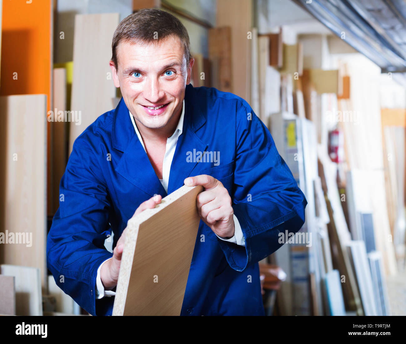 Professional workman standing plywood hi-res stock photography and ...