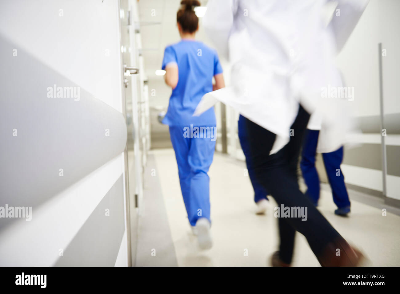Doctor running in corridor hi-res stock photography and images - Alamy