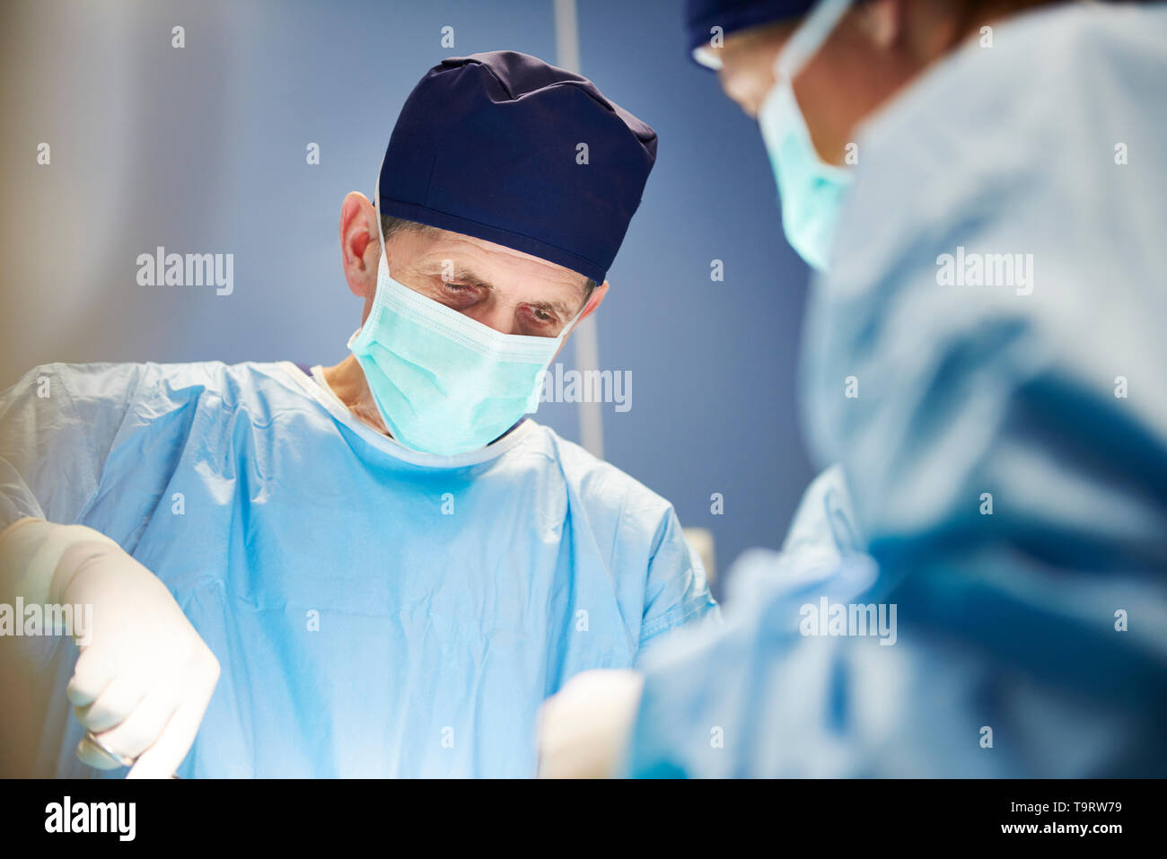Senior surgeon during very important operation Stock Photo - Alamy