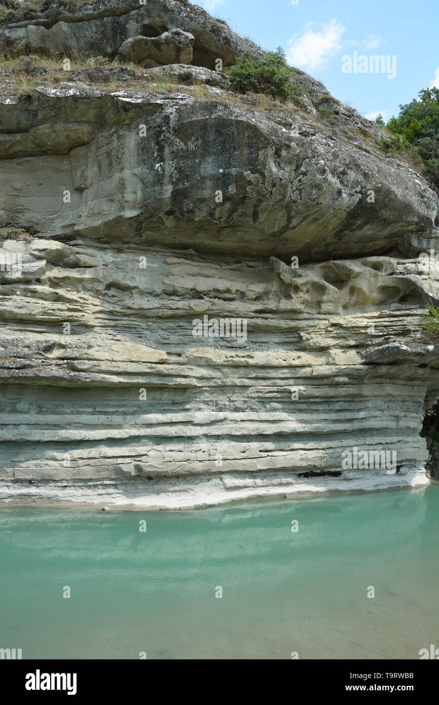 Geological rock formations in Haliacmon river in Nestorio, Greece Stock ...