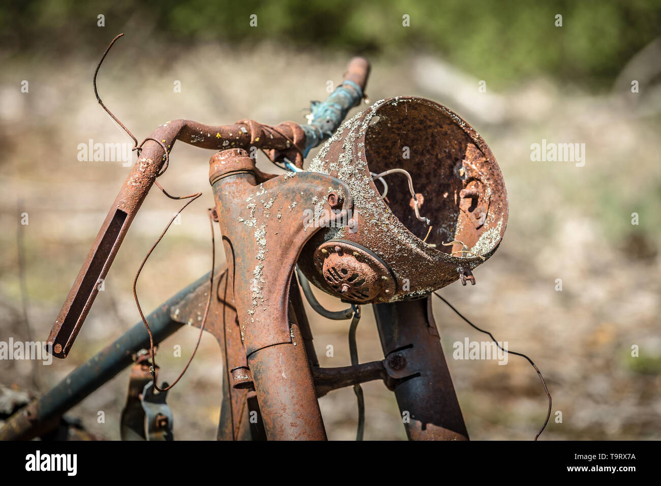 Rusted frame of a motorcycle an abandoned village in Belarus, Chernobyl ...