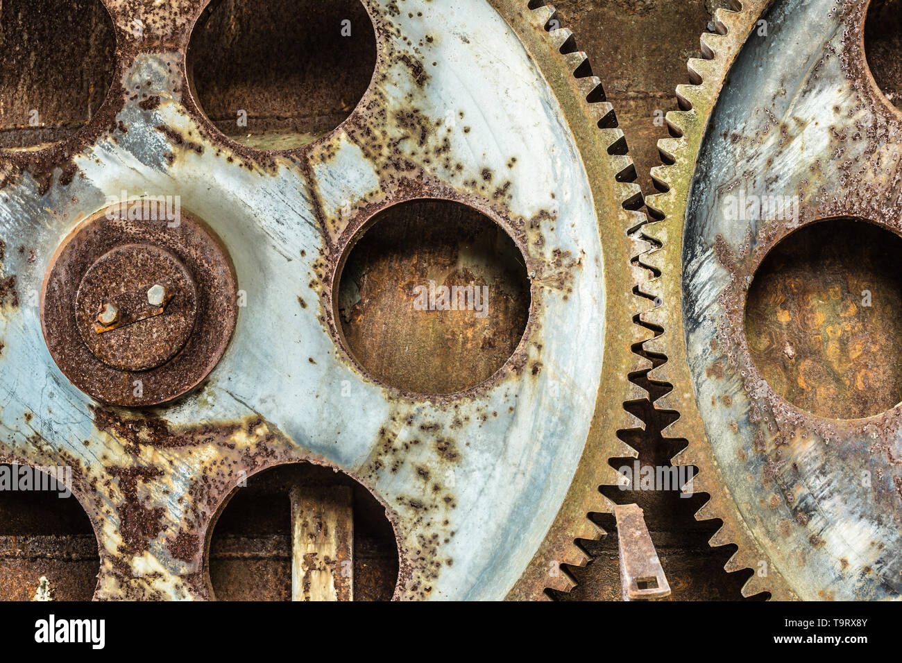 Two large rusted gear wheels in an abandoned factory Stock Photo - Alamy