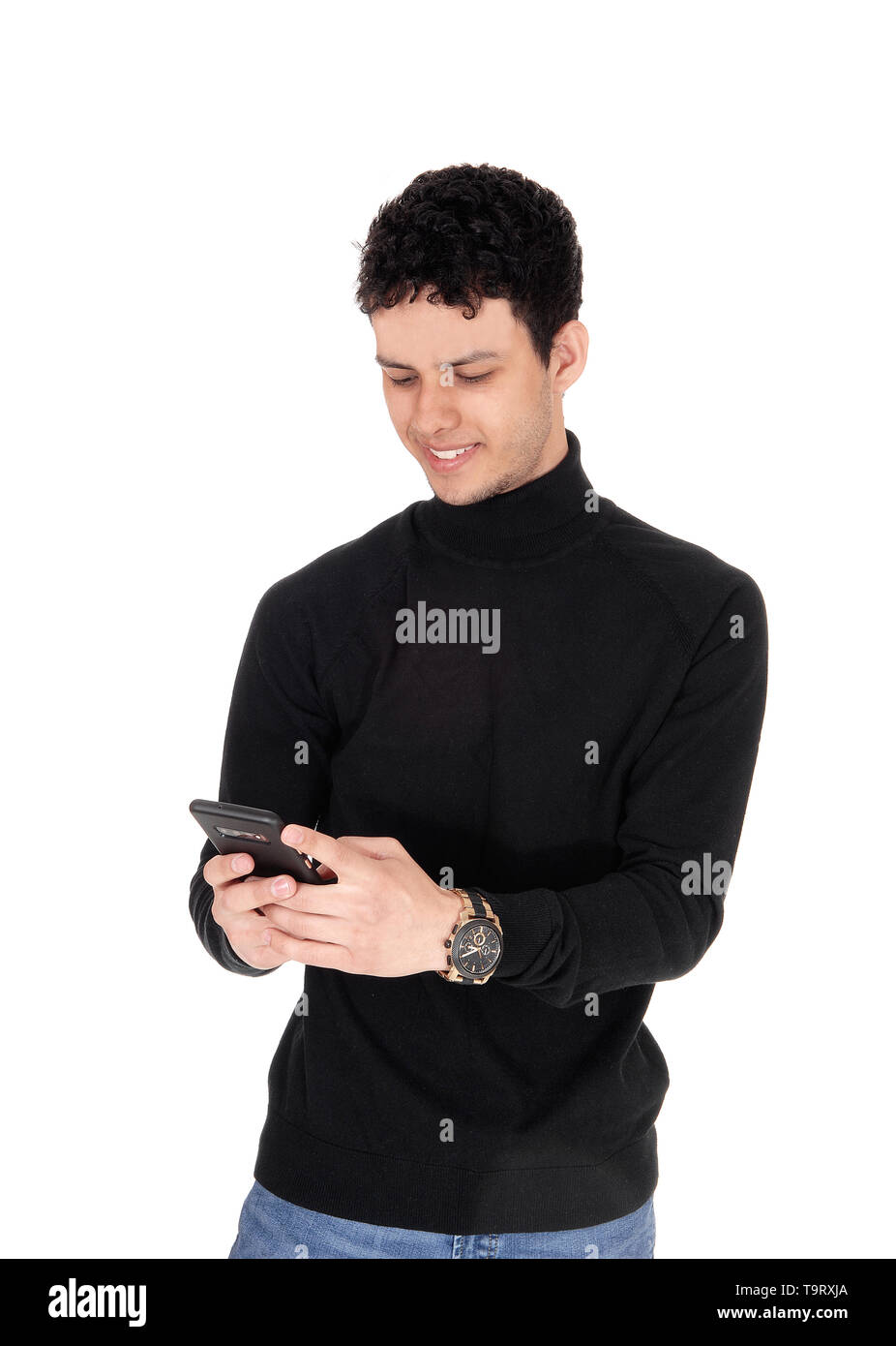 A close up image of a smiling young man is happy over the message he ...
