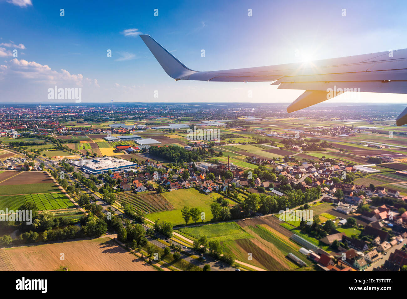 Airplane windows view above the earth on landmark down. View from an ...