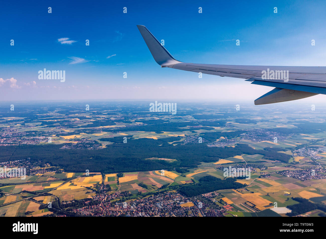 Airplane windows view above the earth on landmark down. View from an ...