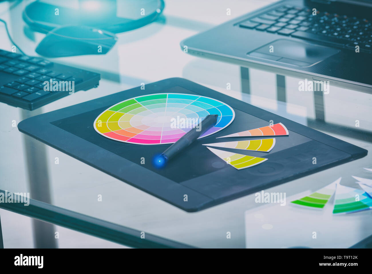 Designer tools used in office graphics tablet color wheel and computers ...