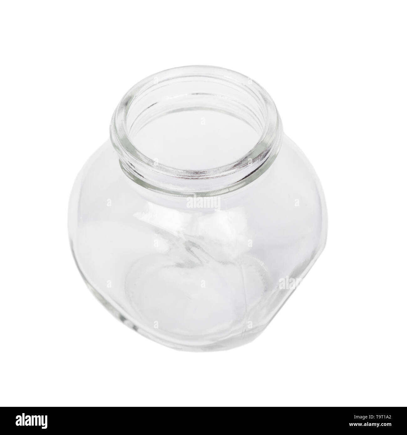 One small empty glass jar isolated on white background Stock Photo - Alamy