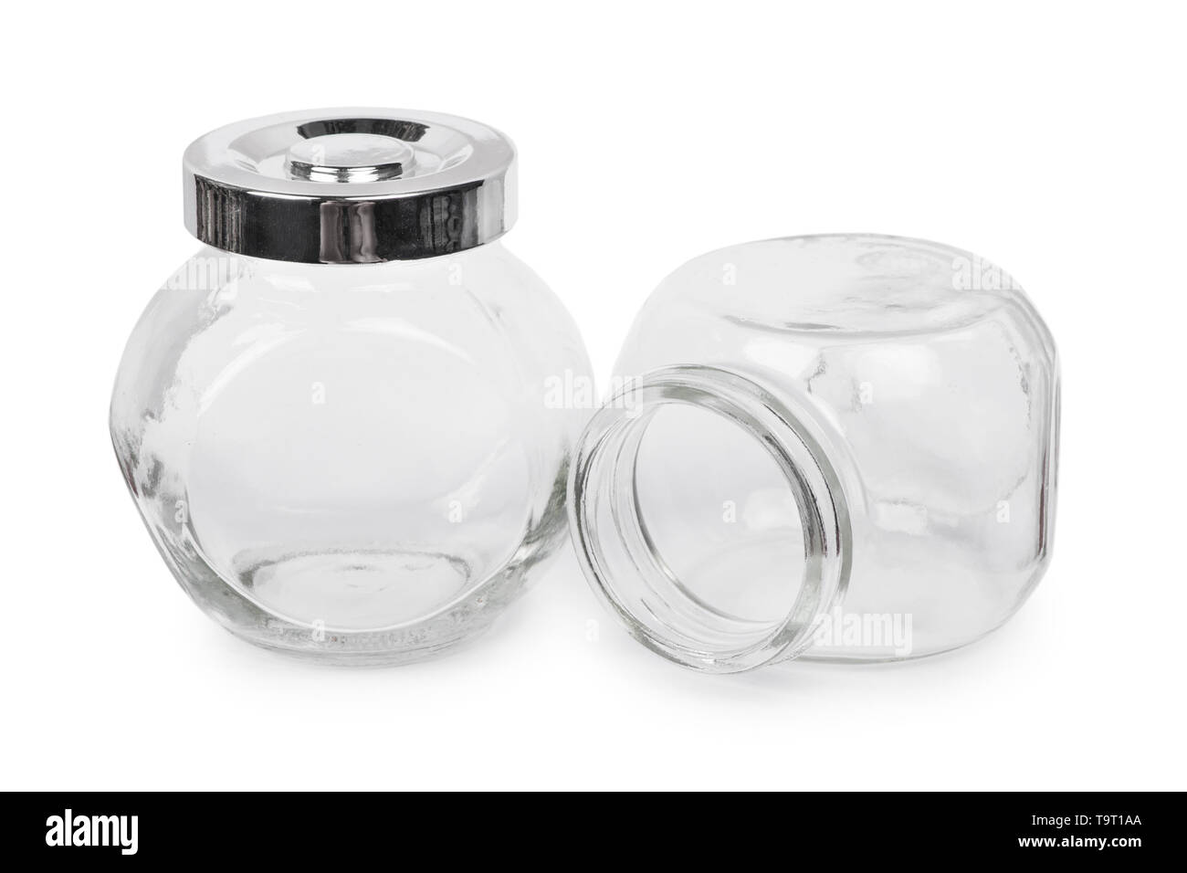 Two small empty glass jars isolated on white background Stock Photo - Alamy