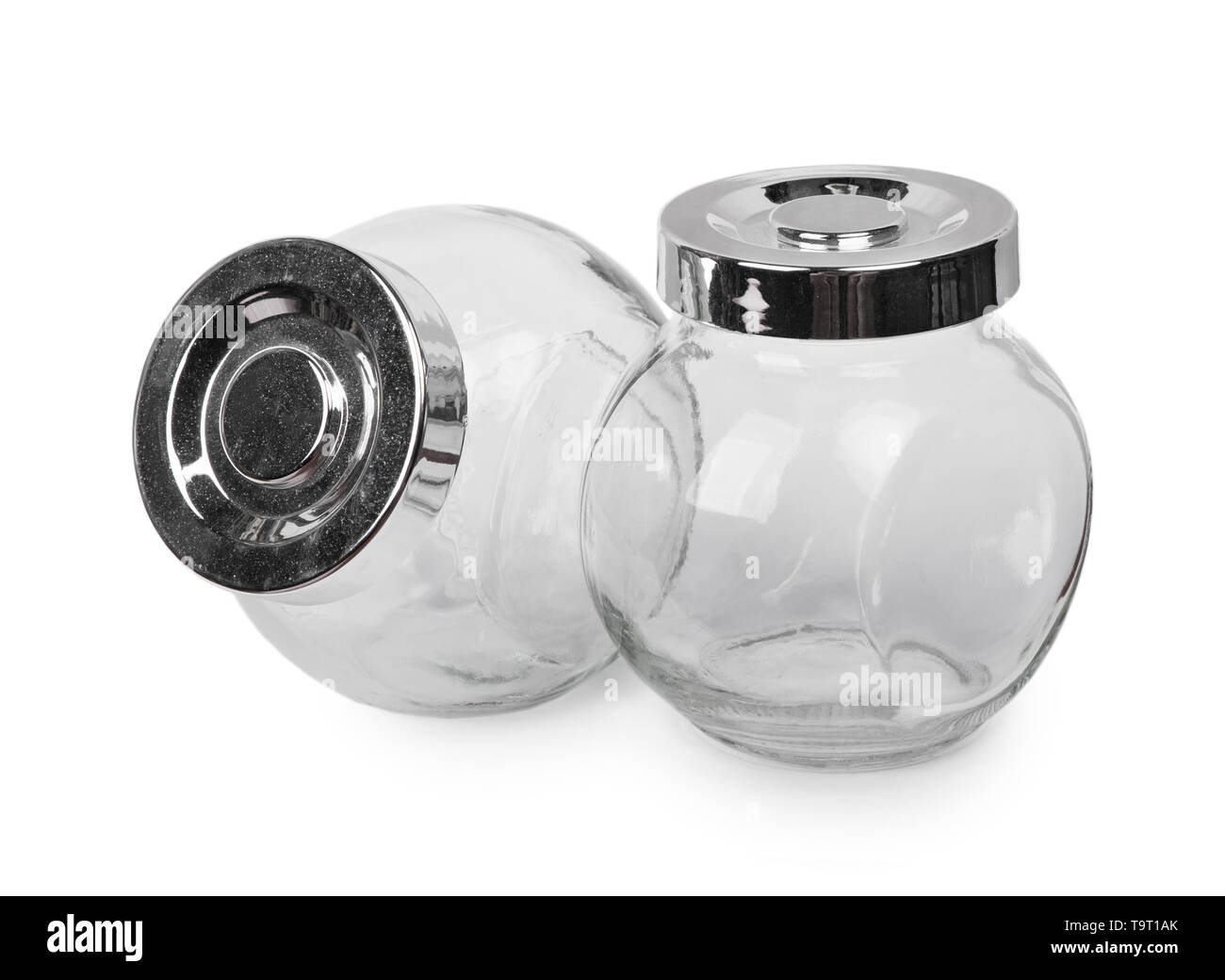 Two small empty glass jars isolated on white background Stock Photo - Alamy