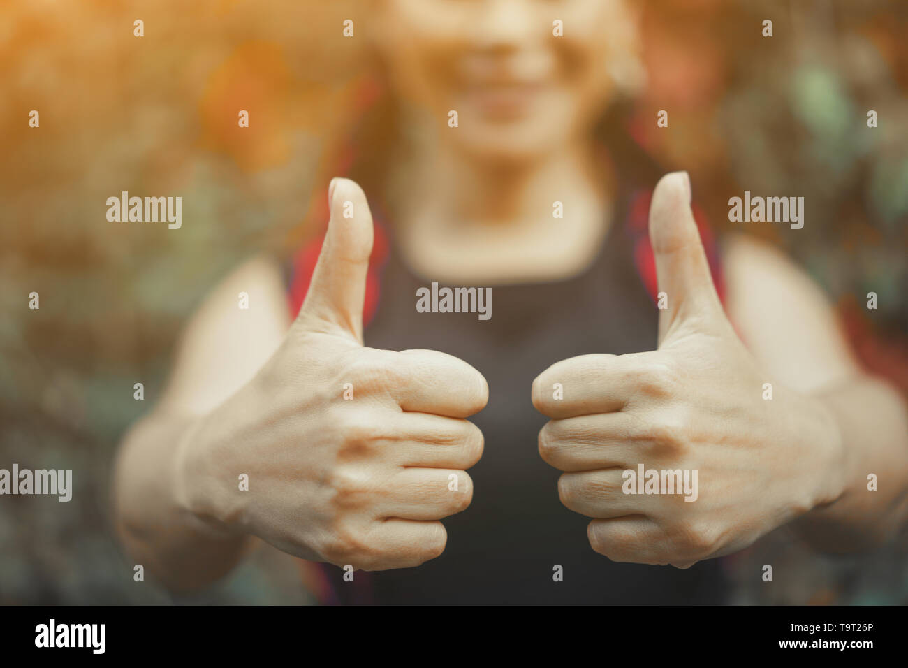 Close-up Thombs Up by Asian Female Model Outdoor Stock Photo - Alamy