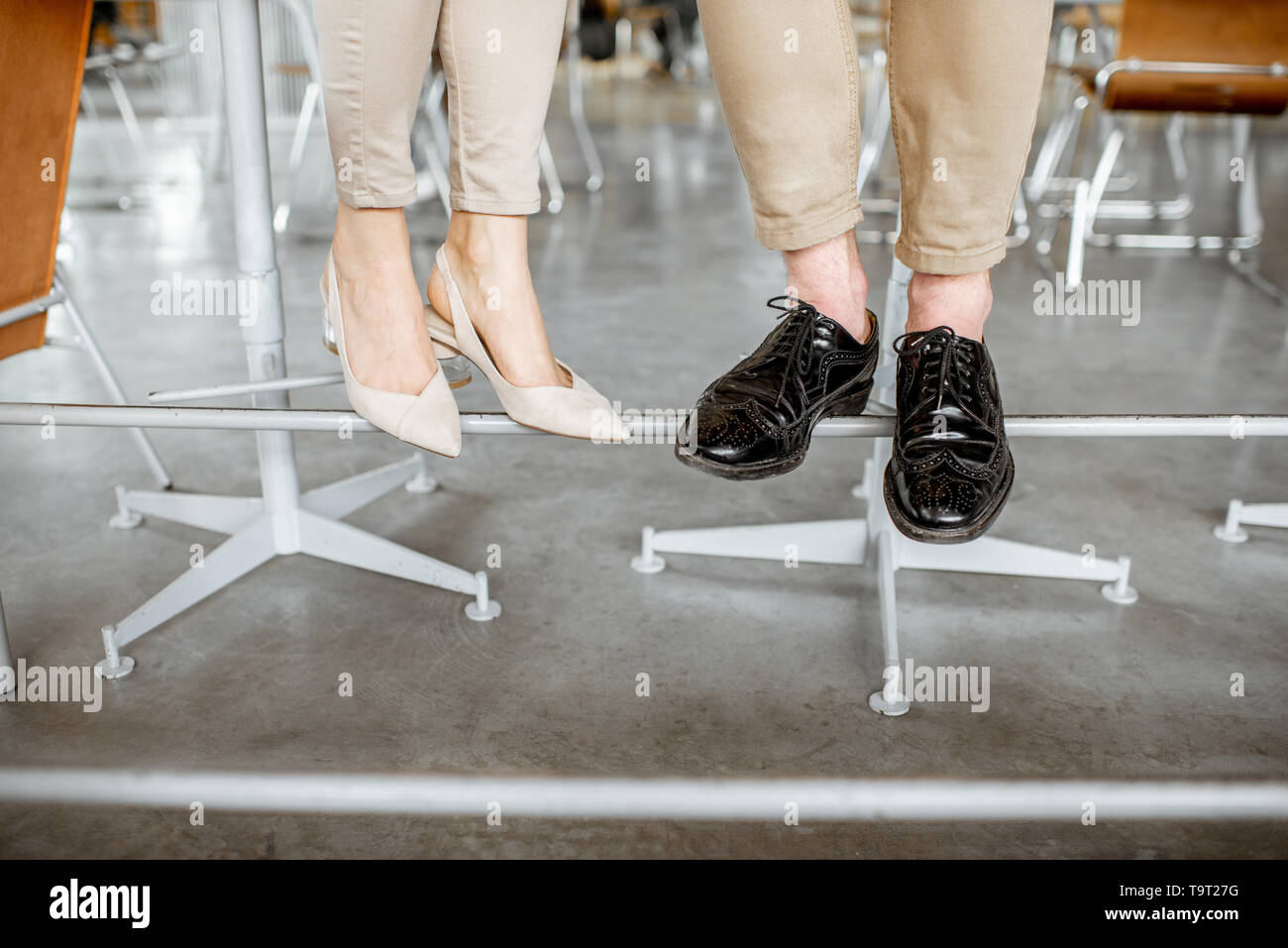 Legs under table hi-res stock photography and images - Alamy