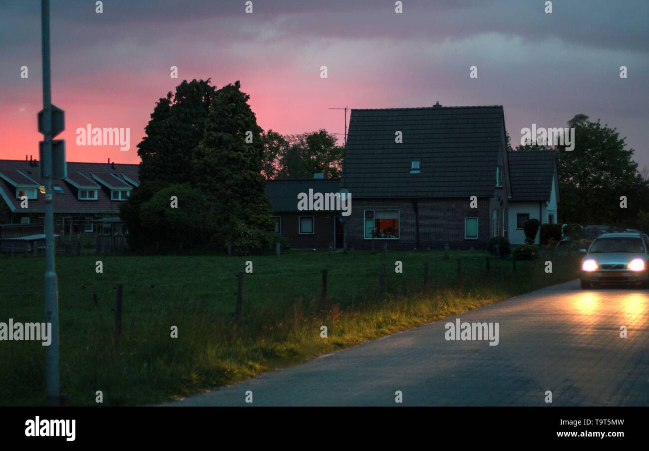 Rural area with car by night Stock Photo - Alamy