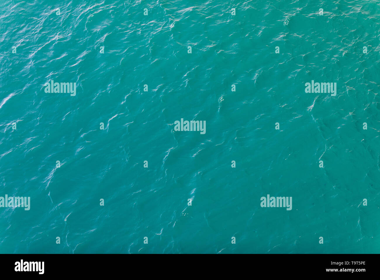Background shot of aqua sea water surface. Sea surface aerial view ...