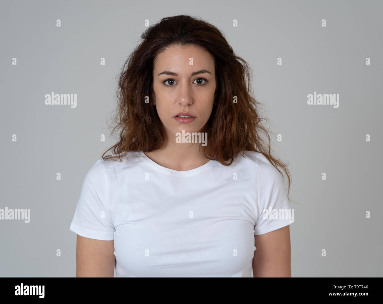 Portrait of young woman feeling scared and shocked making fear, anxiety ...