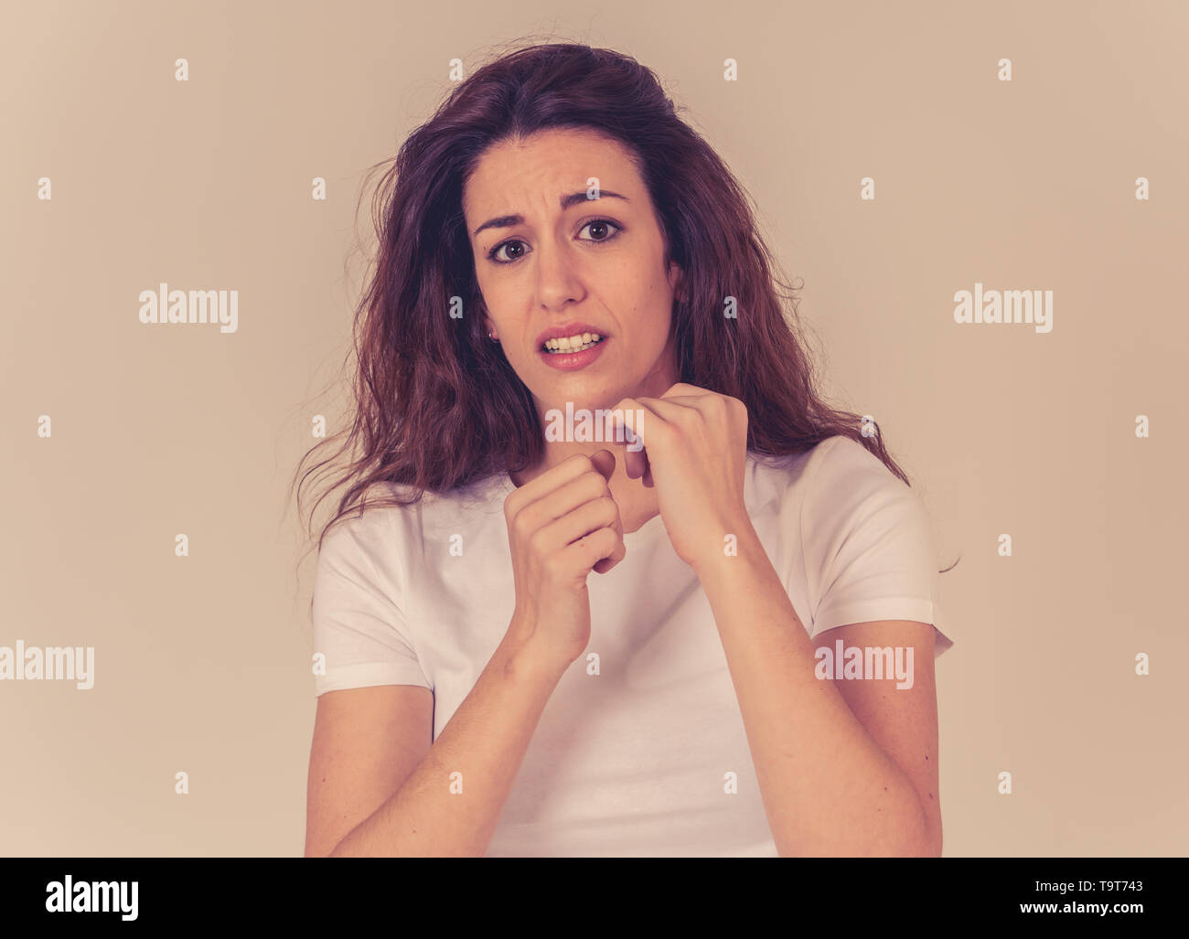 Portrait Of Young Woman Feeling Scared And Shocked Making Fear Anxiety