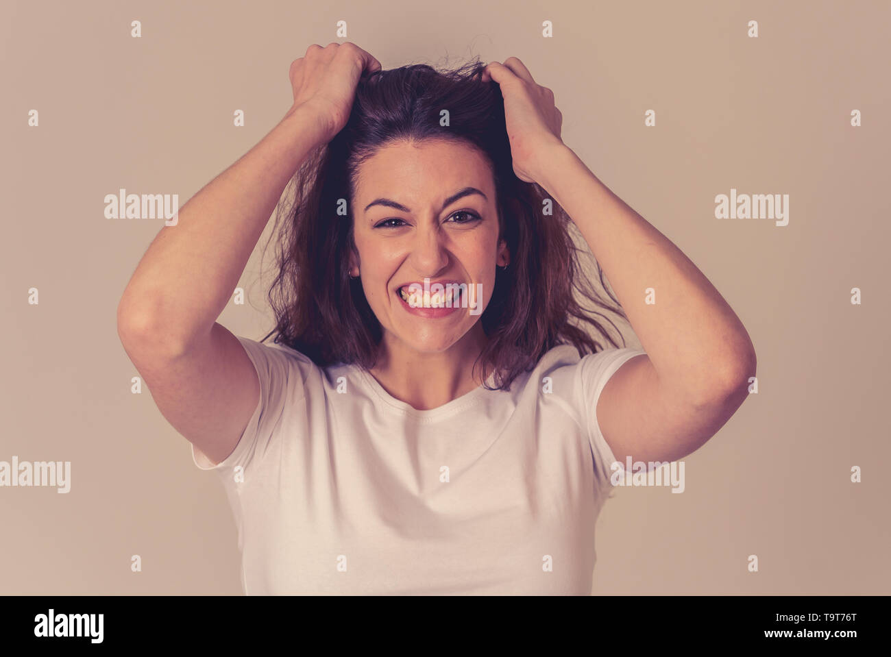 Portrait of beautiful shocked woman winning or having great success ...