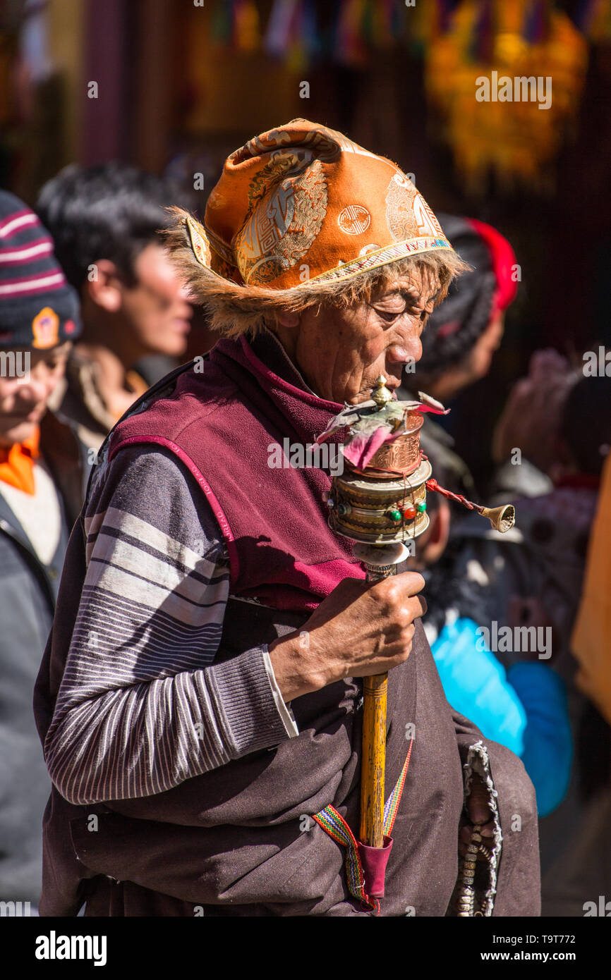 A Tibetan Buddhist pilgrim from the Kham region of eastern Tibet ...