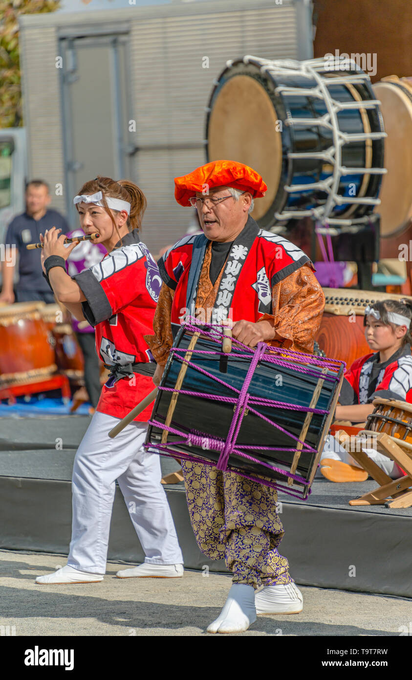 Traditional Taiko drummer performing at a local competition in Tokyo ...