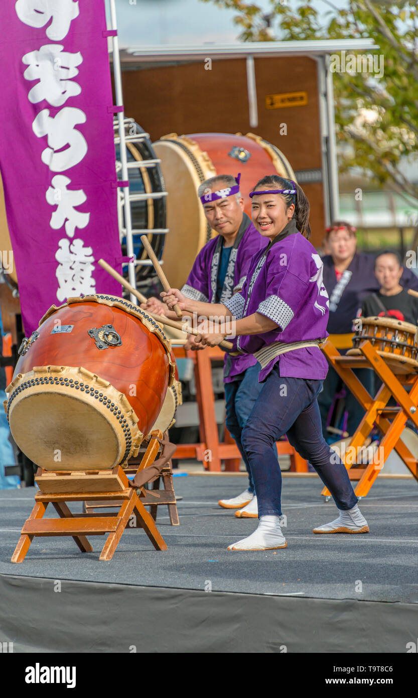 Traditional Taiko drummer performing at a local competition in Tokyo ...