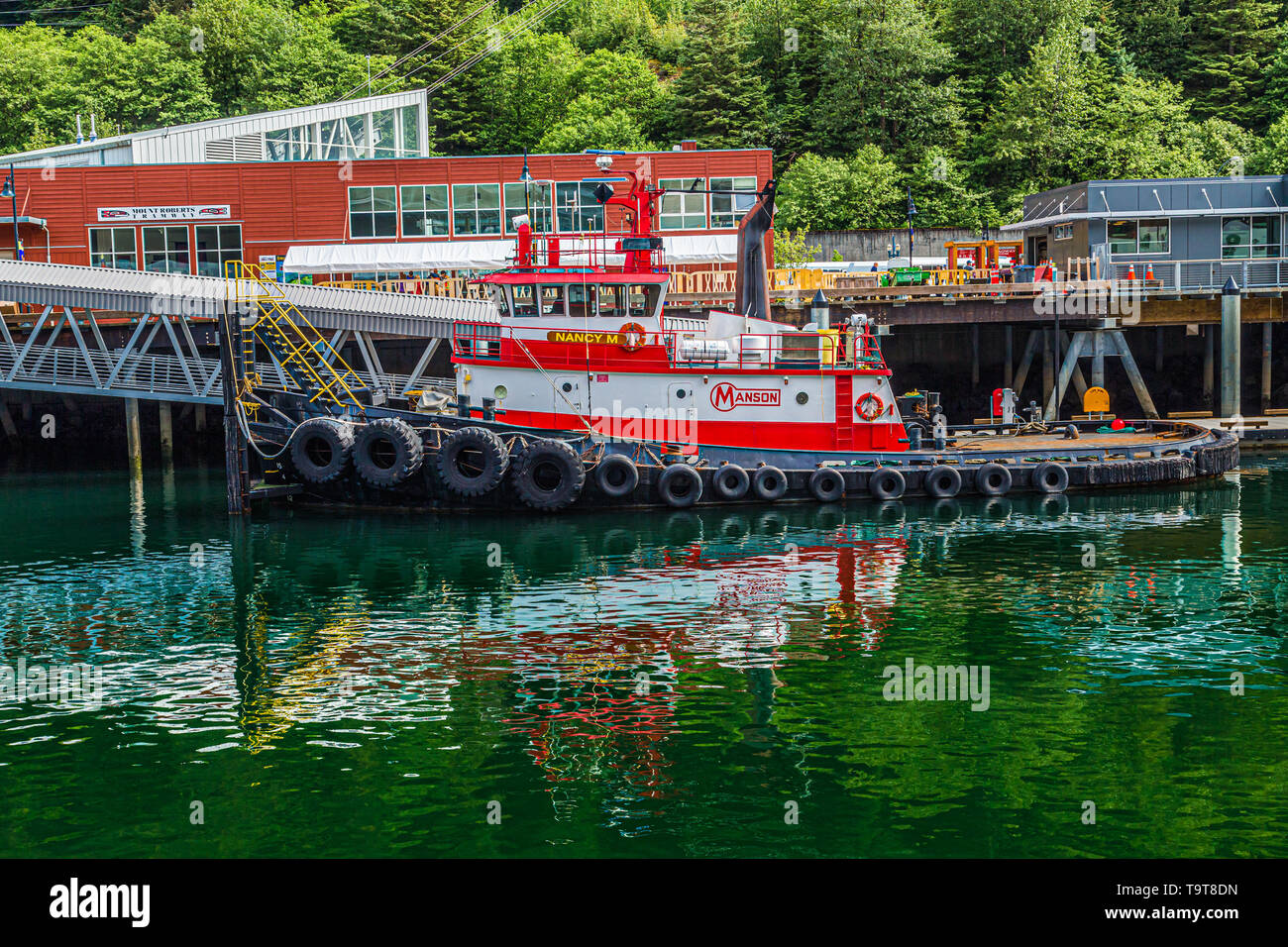 Waterfront buildings with tugboat hi-res stock photography and images ...