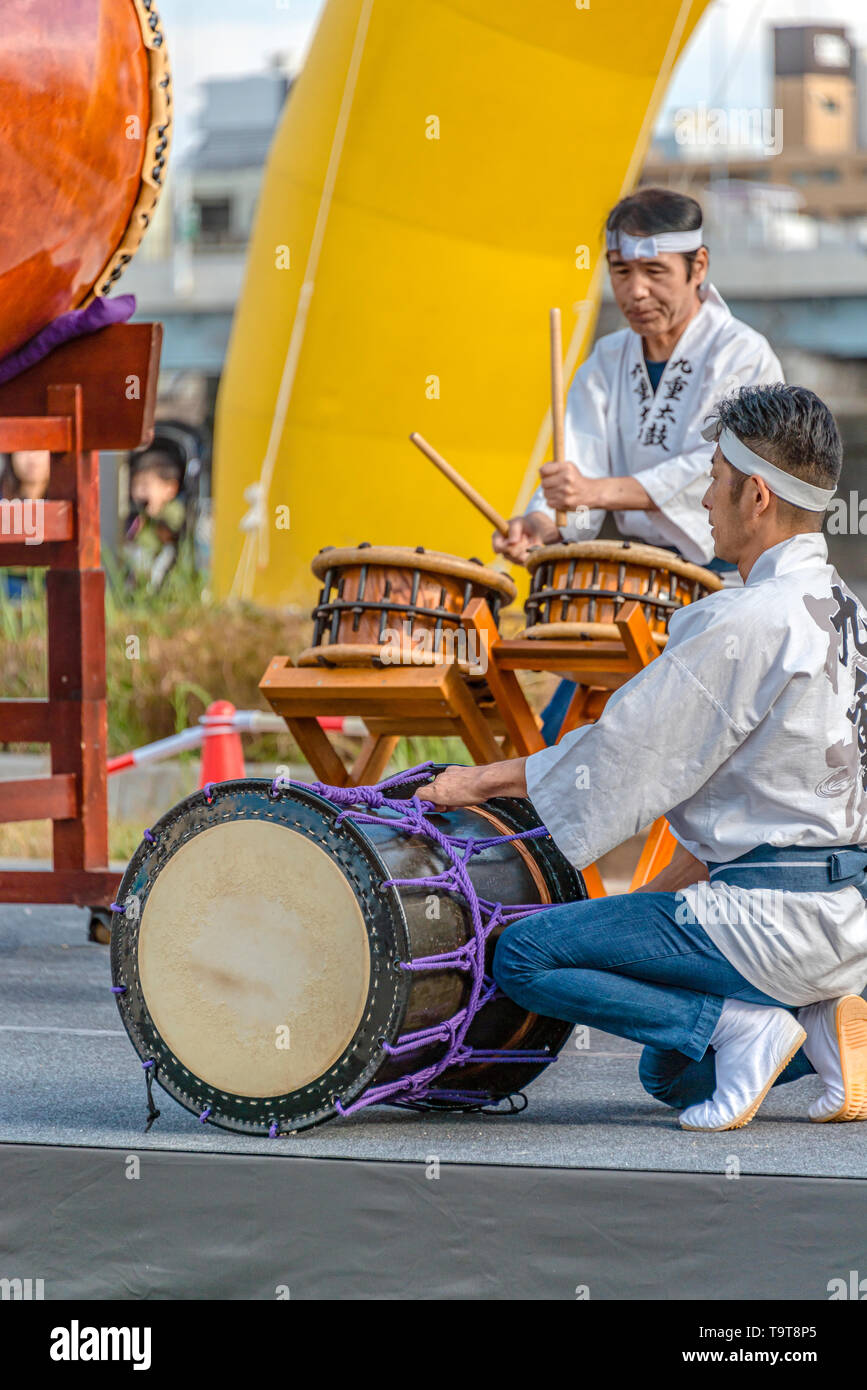 Traditional Japanese Taiko drummer performing at a local competition in ...