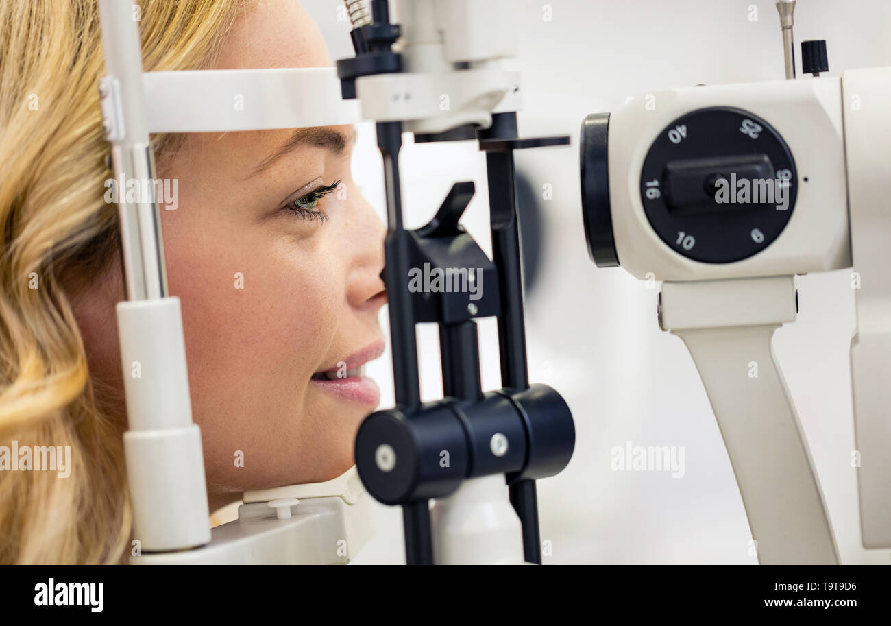 Close up of female patient determines eye diopter in eye clinic Stock ...