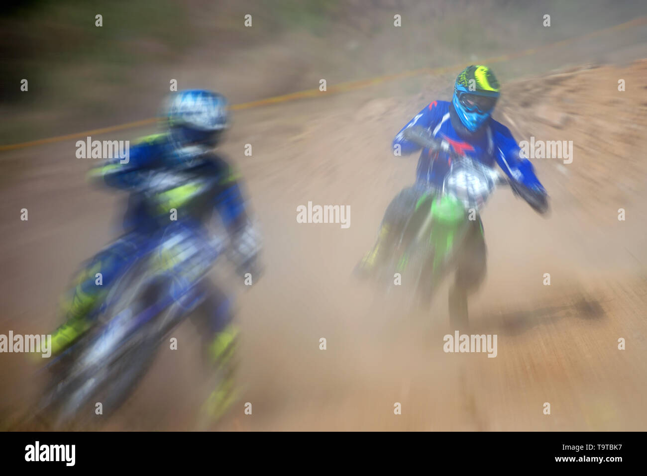 Blurry image of motorcycle rider during motocross race Stock Photo - Alamy