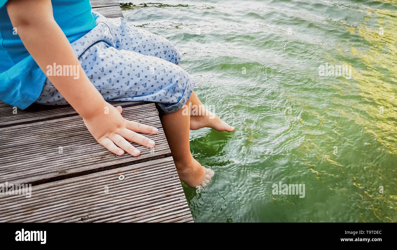 Kids splashing in pond hi-res stock photography and images - Alamy