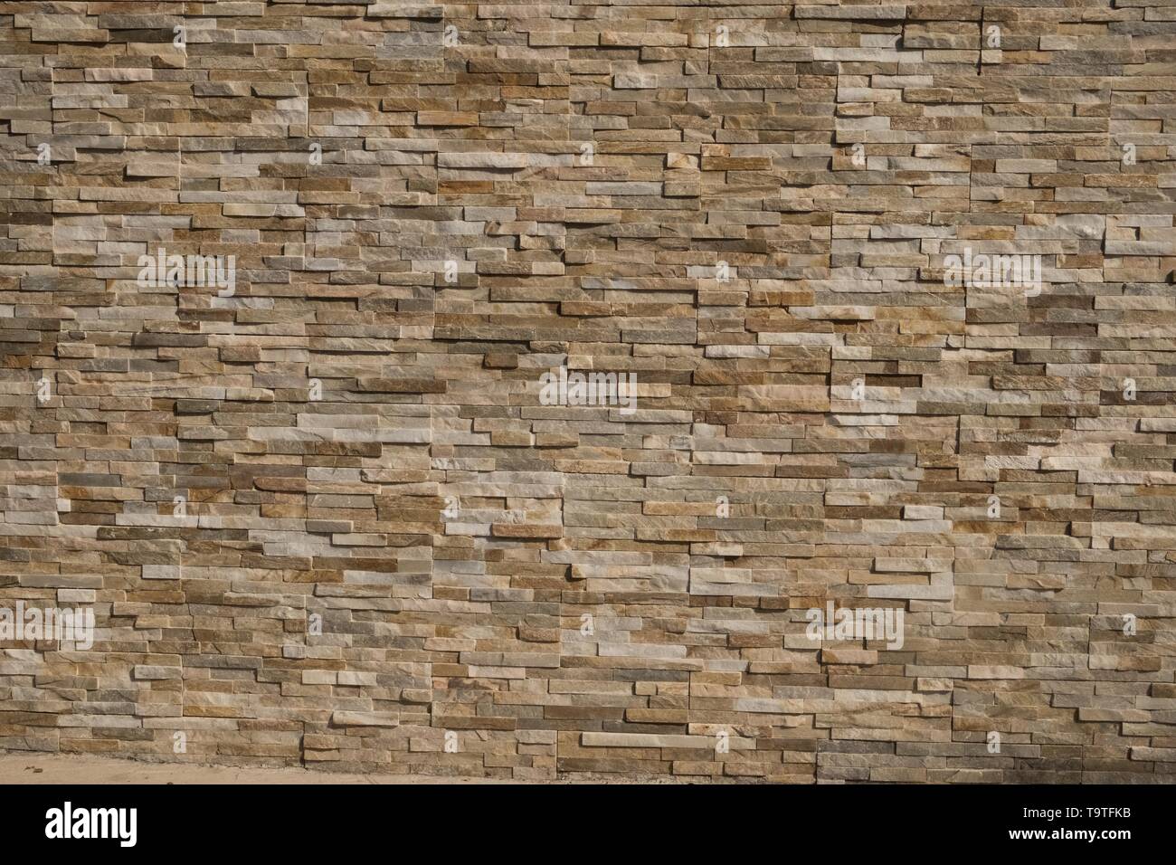 Stone Wall background from modern building contruction facade Stock ...