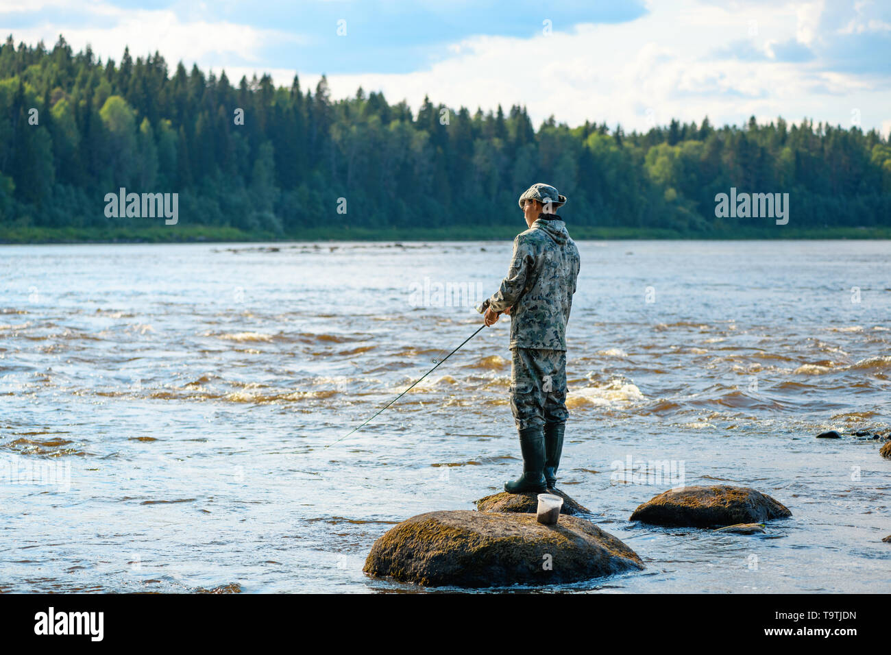 Fisherman suit river hi-res stock photography and images - Alamy