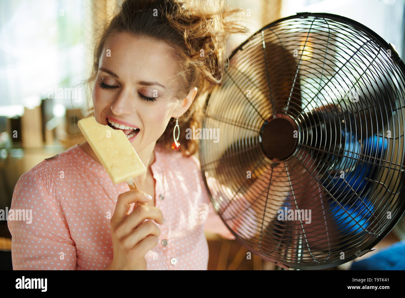 Too hot woman sweating ice hi-res stock photography and images - Alamy