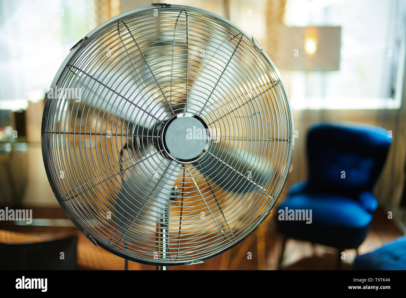 Closeup on working electric floor standing fan in the modern house in ...