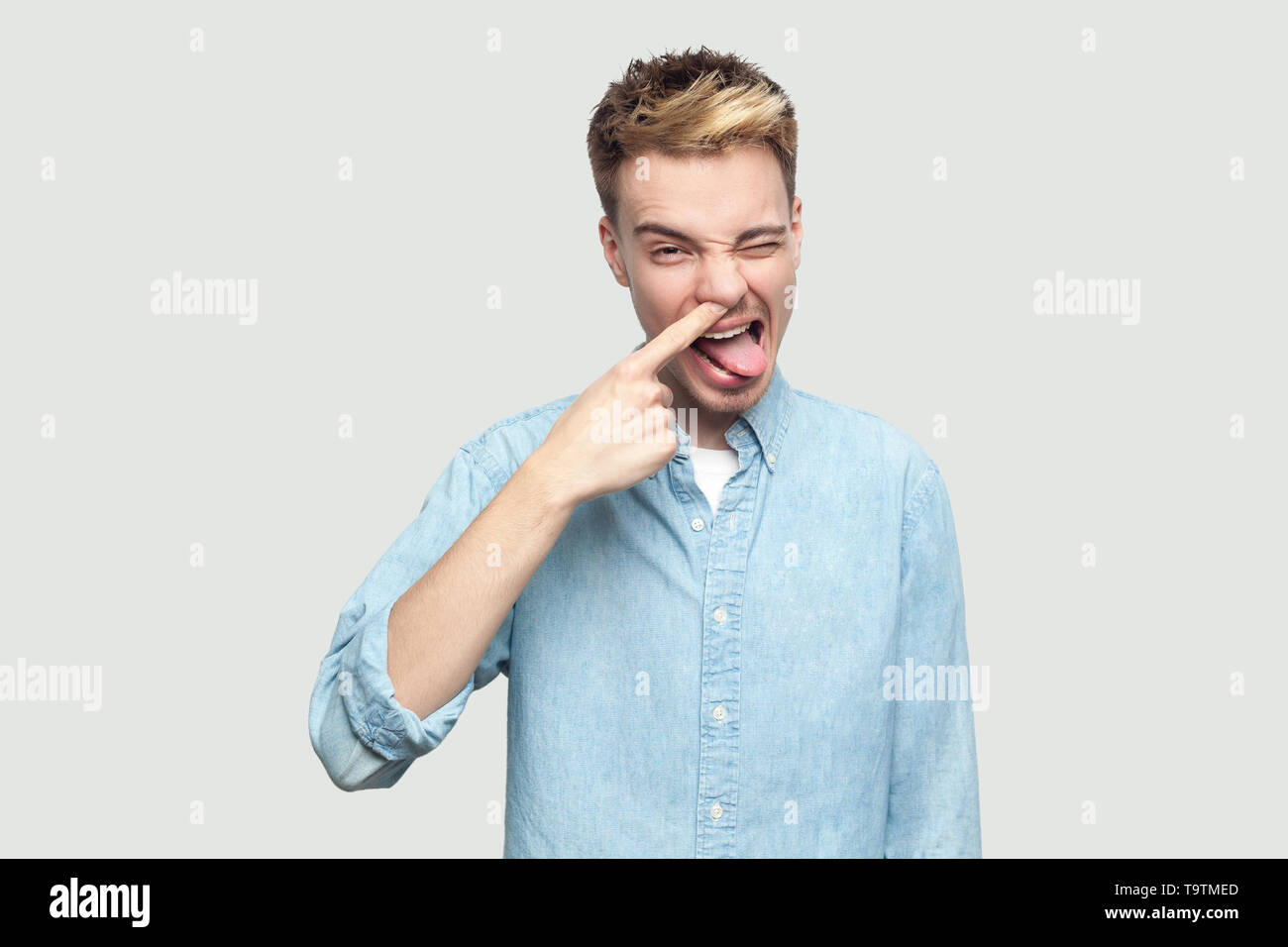 Man picking his nose hi-res stock photography and images - Alamy