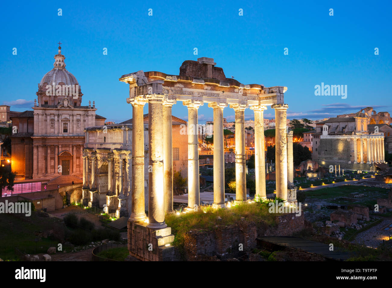 famous Roman Forum - ancient ruins in Rome at night, Italy Stock Photo ...