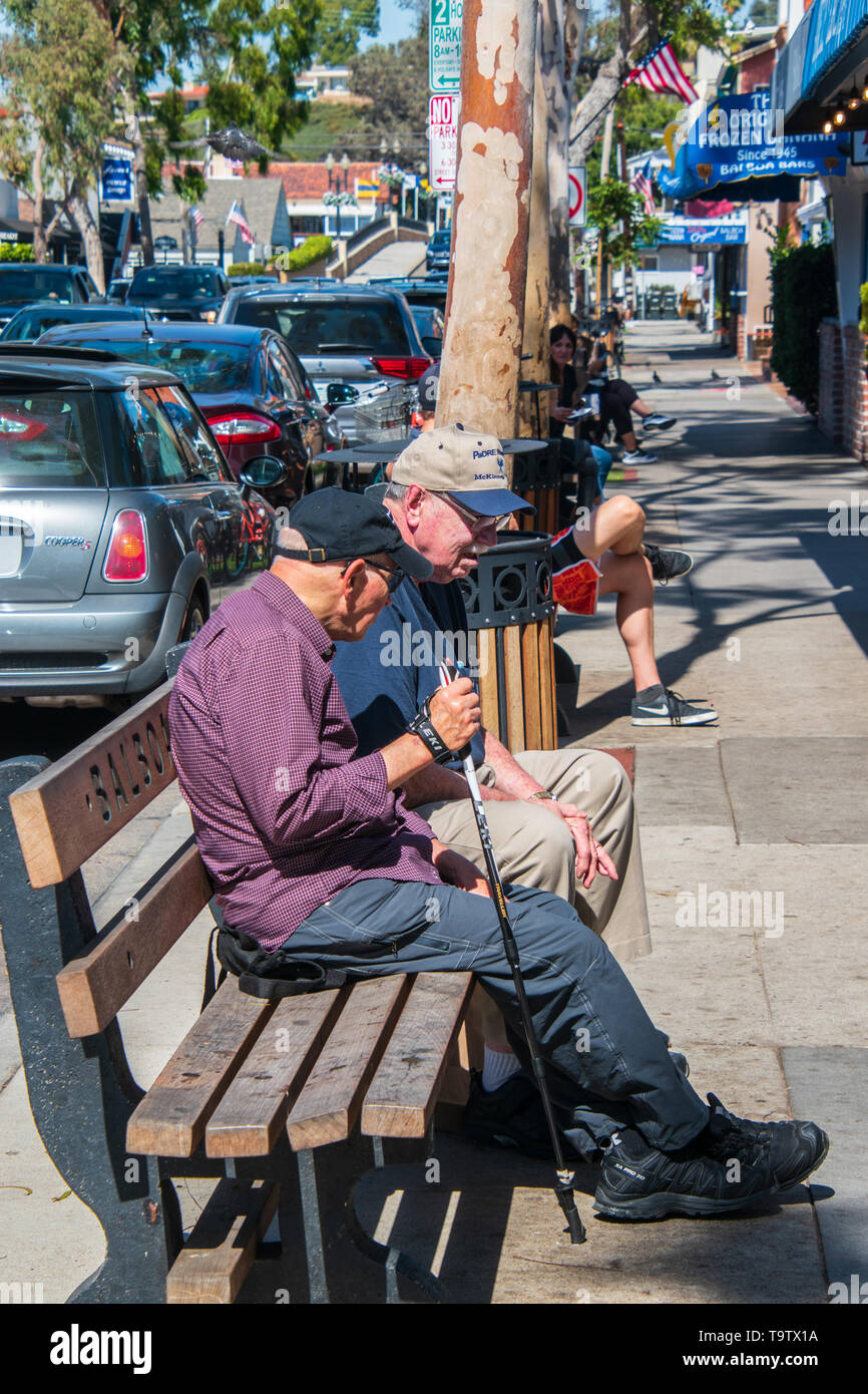Two old men talking in park hi-res stock photography and images - Alamy