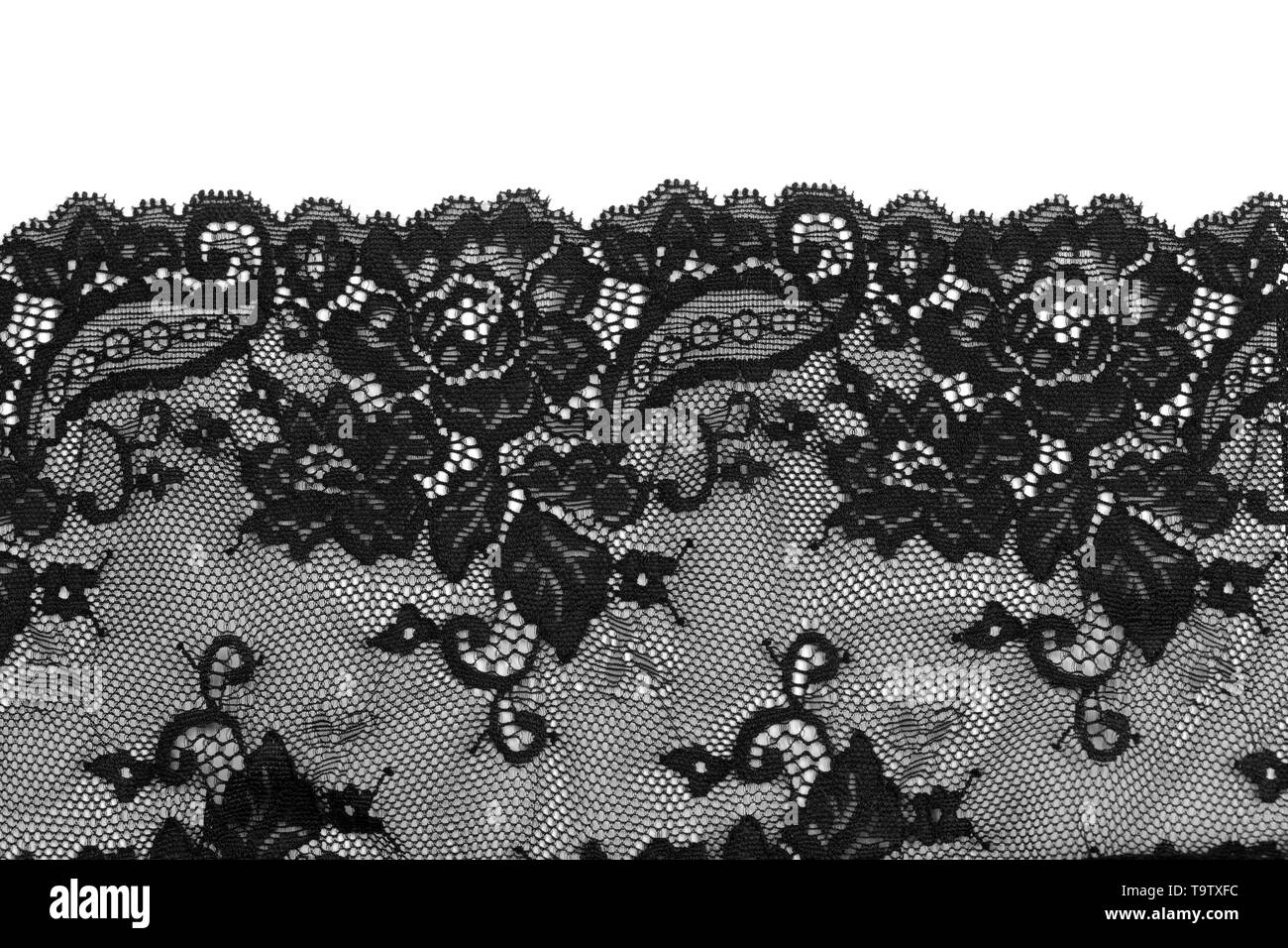 Black lace isolated on white background Stock Photo - Alamy