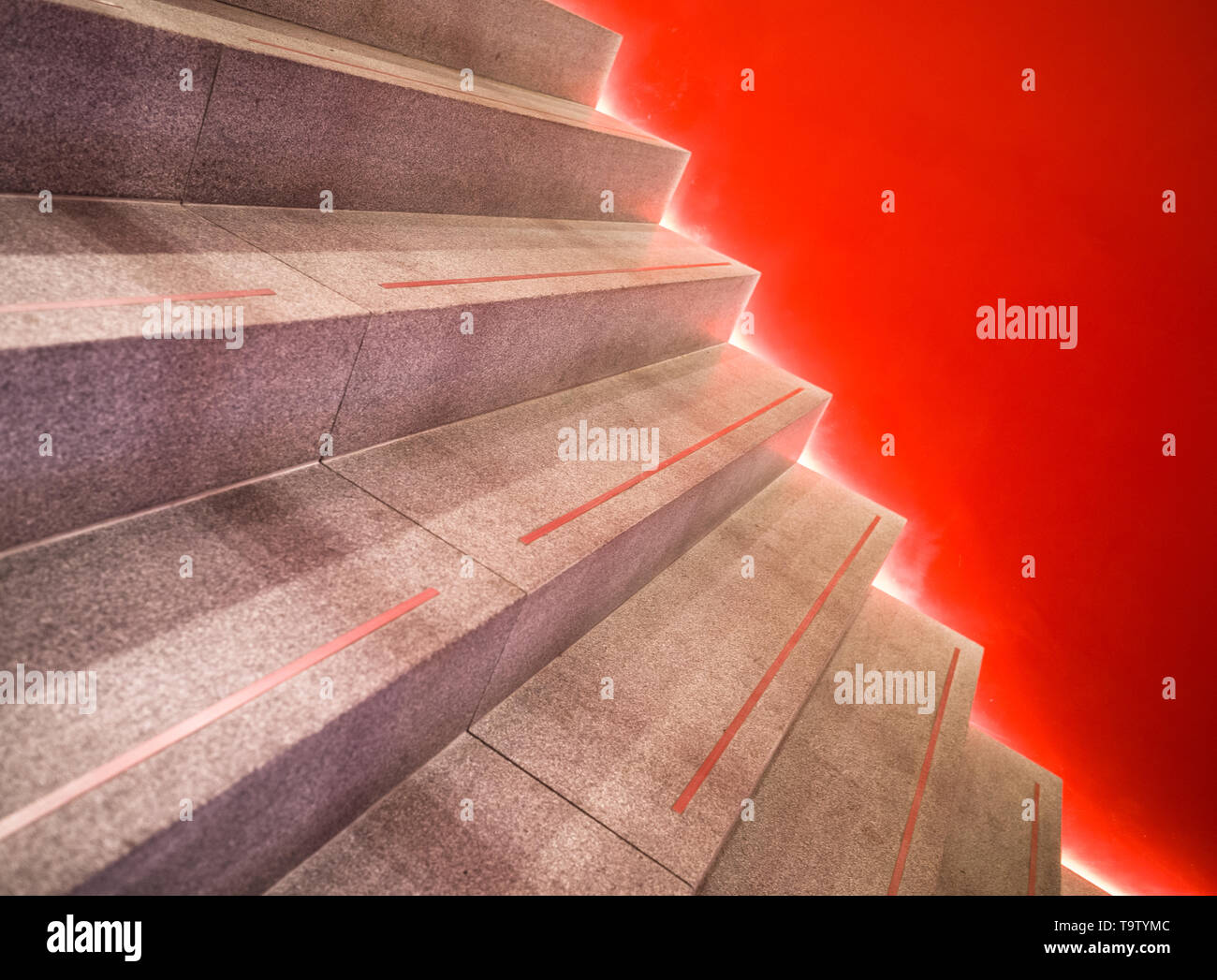 Futuristic backlit modern staircase Stock Photo - Alamy