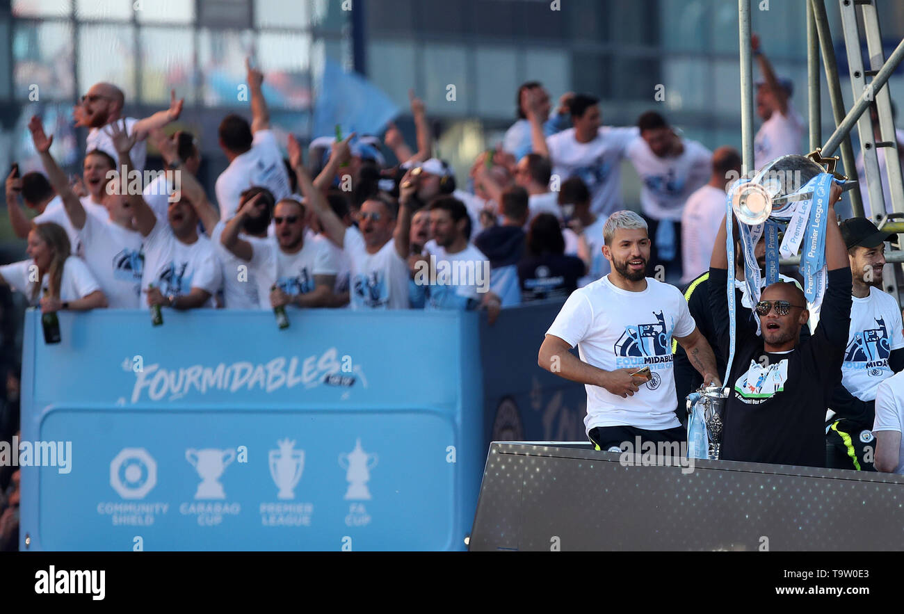 Manchester City's Vincent Kompany lifts the Premier League trophy ...