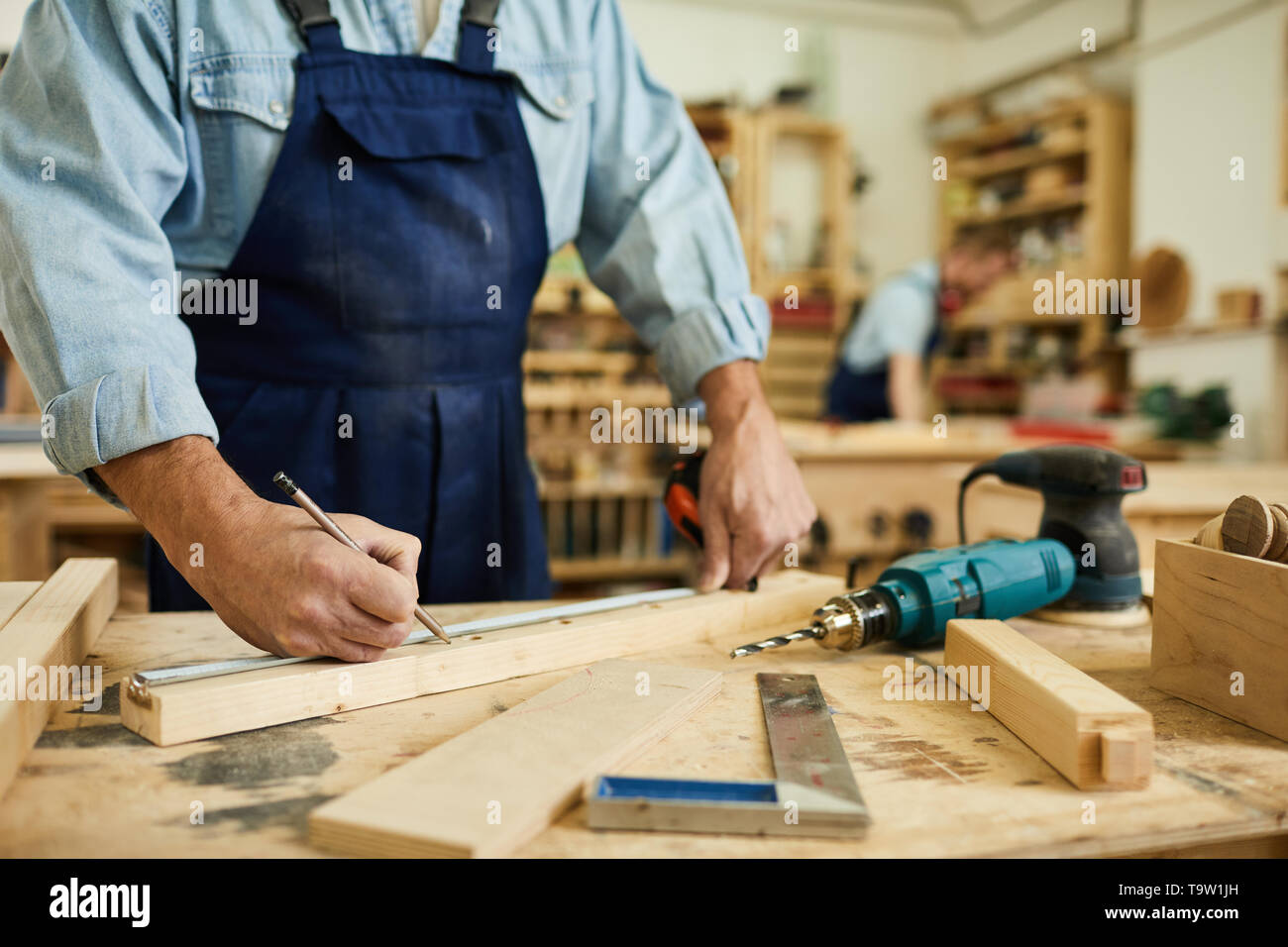 Close up unrecognizable male carpenter hi-res stock photography and ...
