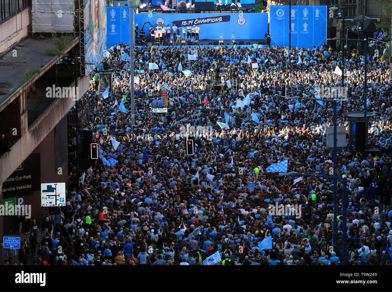 The Manchester City players and staff on stage during the trophy parade ...