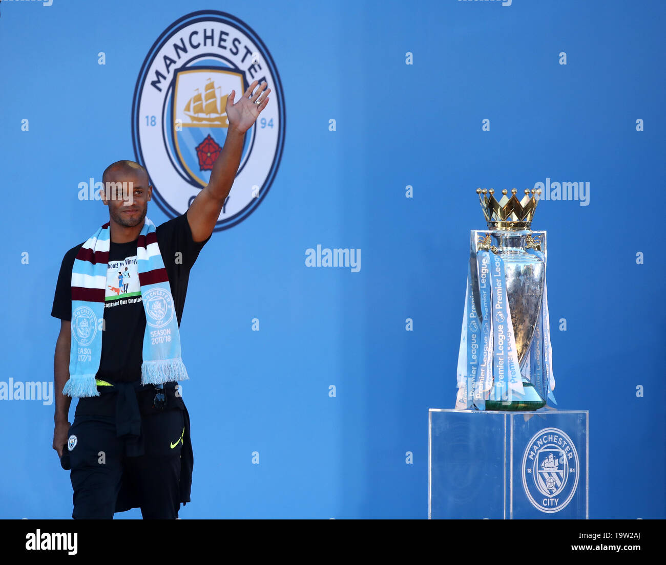 Manchester City's Vincent Kompany waves to fans during the trophy ...
