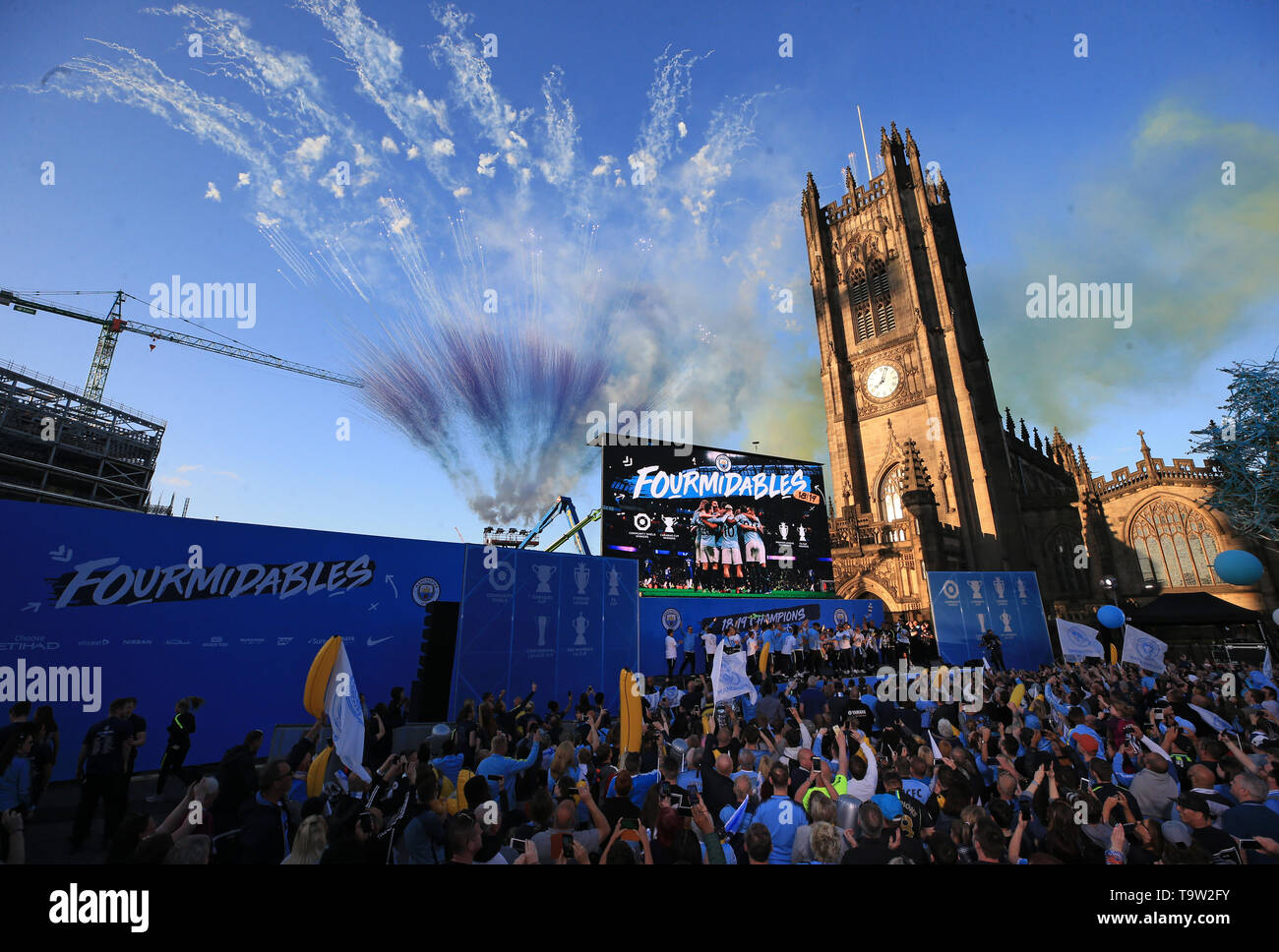 Fireworks go off as Manchester City celebrate onstage during the trophy ...